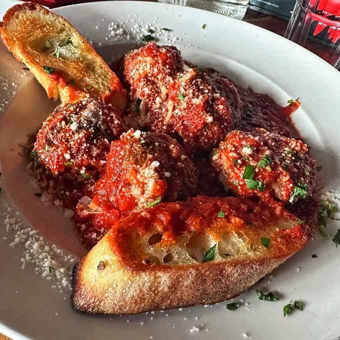 Meatballs this photogenic should come with their own Instagram filter and a warning about drooling.