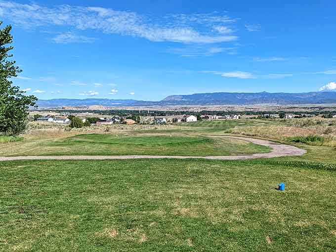 Mountain views stretch across the horizon, reminding you that Colorado's natural beauty comes standard with every small town visit.