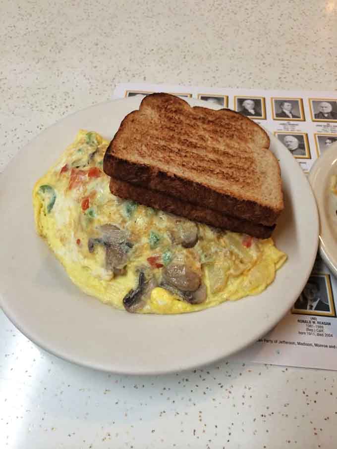 The Western omelette with perfectly toasted bread, proving that some combinations can't be improved upon, only appreciated.