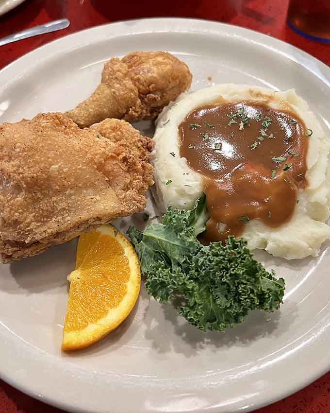 Crispy fried chicken with mashed potatoes and gravy proves that some traditions exist because they're absolutely, undeniably, perfectly right.