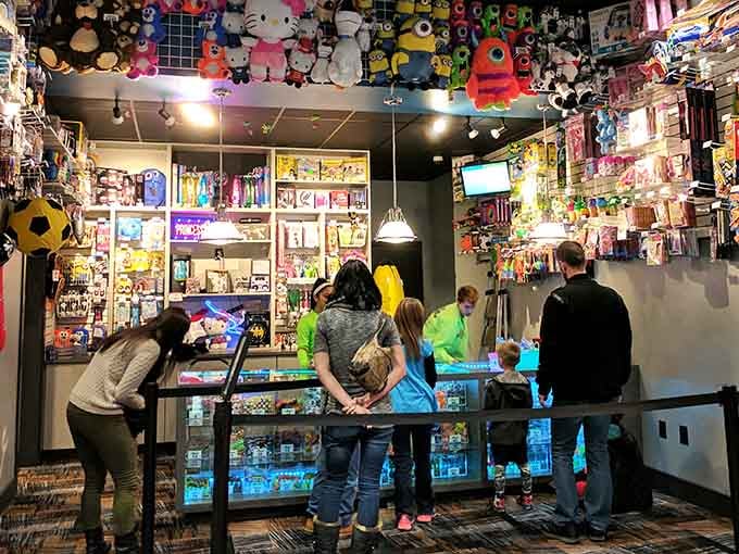 The prize counter displays treasures that'll end up in your couch cushions but mean everything right now.