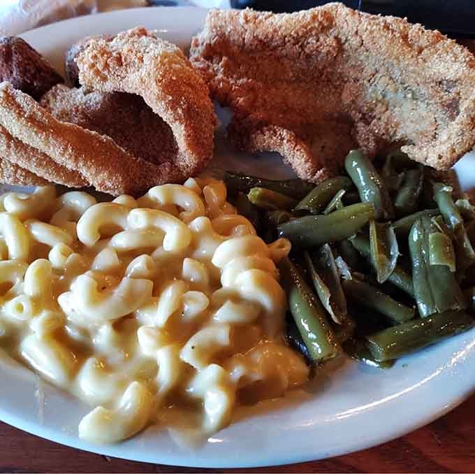 Golden fried catfish meets mac and cheese in a marriage that would make any Southern grandmother proud.