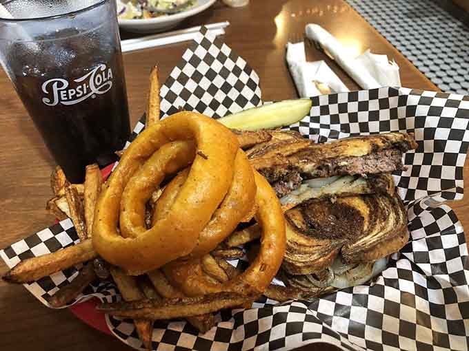 A patty melt paired with golden onion rings is the kind of decision your taste buds will thank you for.