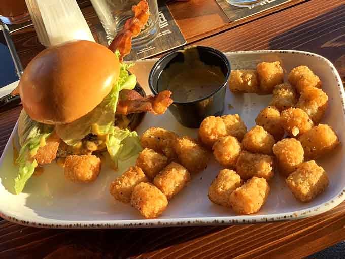 Bacon cascading over melted cheese on a perfectly grilled patty is basically edible poetry on a bun.