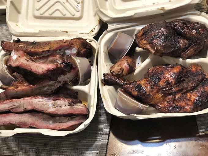 Ribs and chicken sitting side by side, proving that poultry and pork can absolutely get along beautifully.