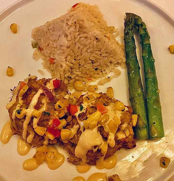 Crab cakes with asparagus and rice prove seafood belongs on every meal's greatest hits album.