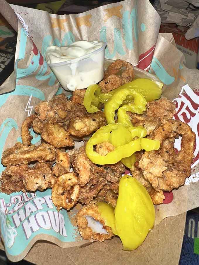 Crispy calamari with banana peppers brings coastal dining vibes to landlocked Wisconsin, complete with creamy dipping sauce.