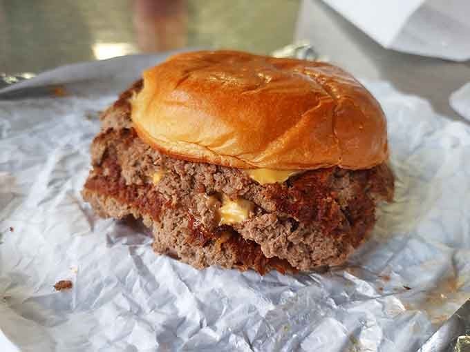 Three hand-formed patties stacked high because sometimes one burger just isn't enough to satisfy your soul properly.