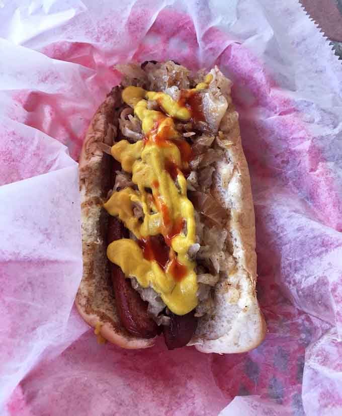 That Polish sausage with grilled onions and peppers proves bigger isn't always worse, sometimes it's perfect.