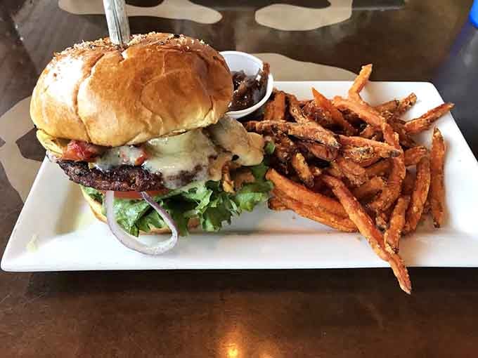 This burger proves that going meatless doesn't mean sacrificing flavor, accompanied by sweet potato fries that steal the spotlight completely.