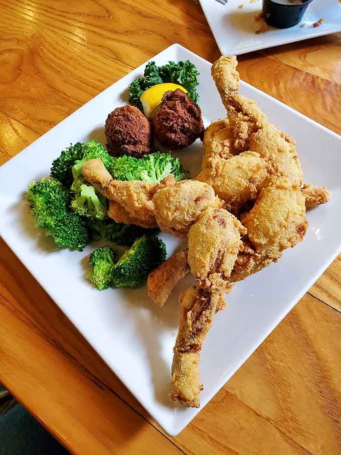 Fried frog legs with hushpuppies and broccoli offer adventurous eaters a taste of true Southern delicacy dining.
