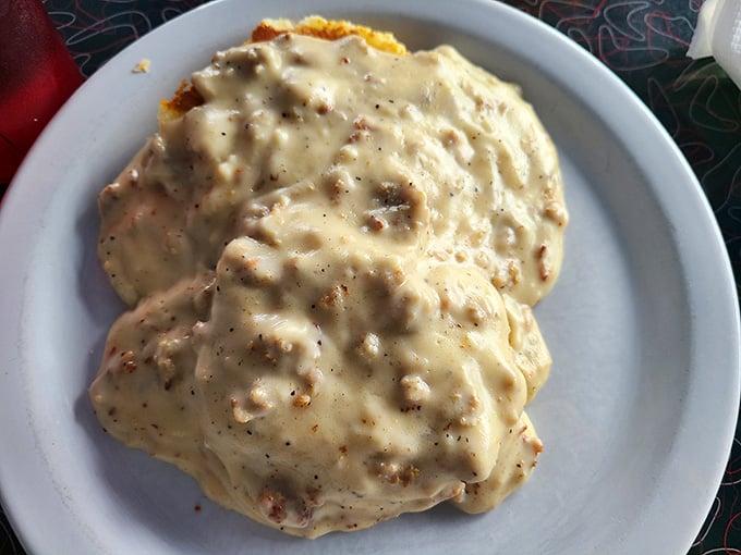 Biscuits drowning in sausage gravy, the Southern breakfast that makes you forget you ever considered eating healthy.