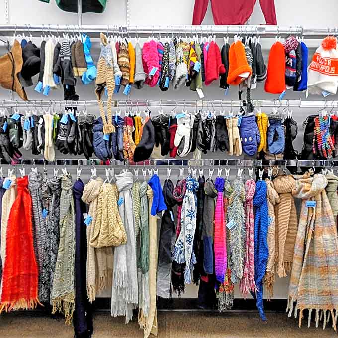 Scarves and accessories creating a textile rainbow that would make Joseph's coat jealous of the color selection.