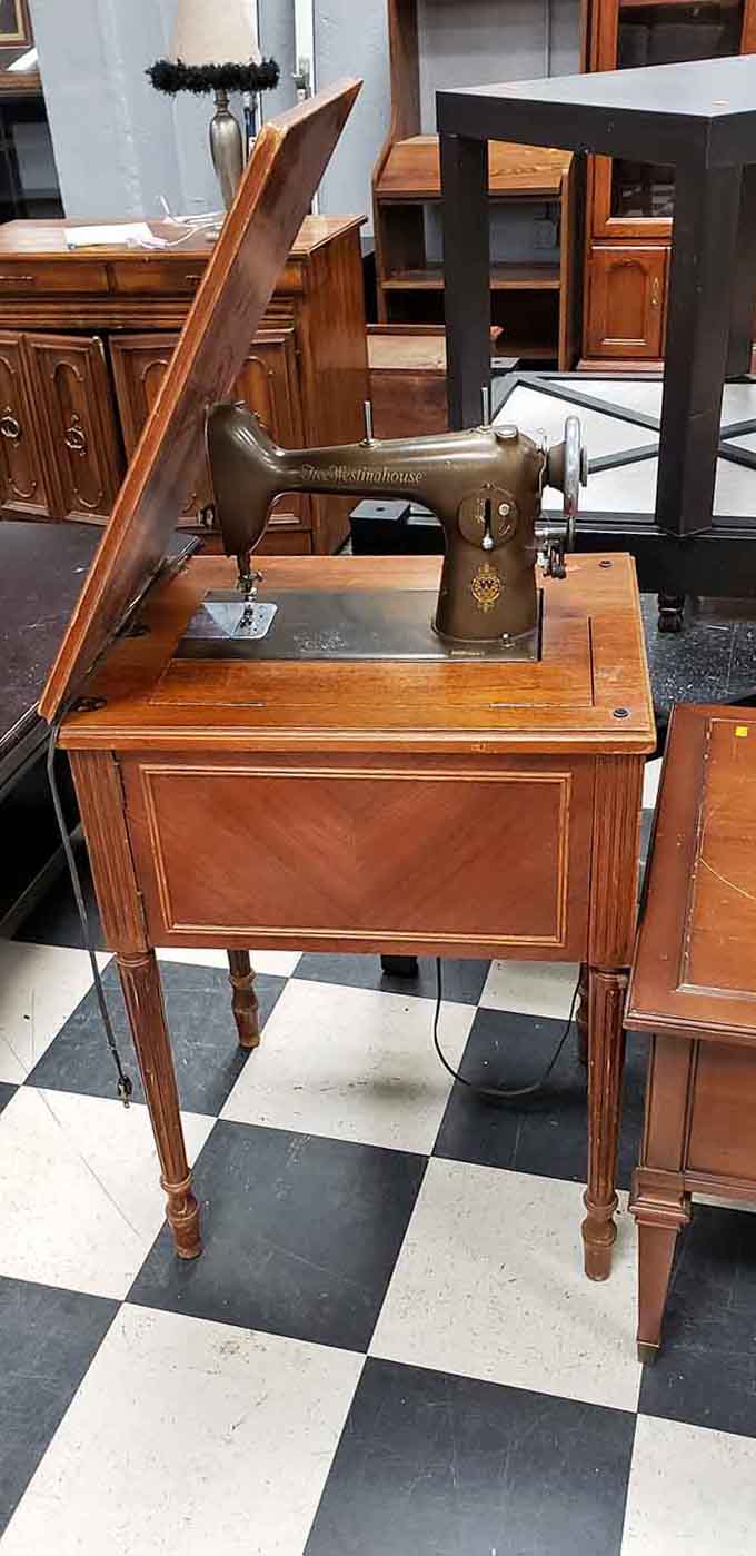 A vintage Westinghouse sewing machine sits ready to stitch memories, or just look incredibly cool in your craft room.