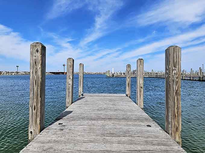 The view from the beach shows Fishtown in its full glory, weathered buildings standing proud against the endless blue.