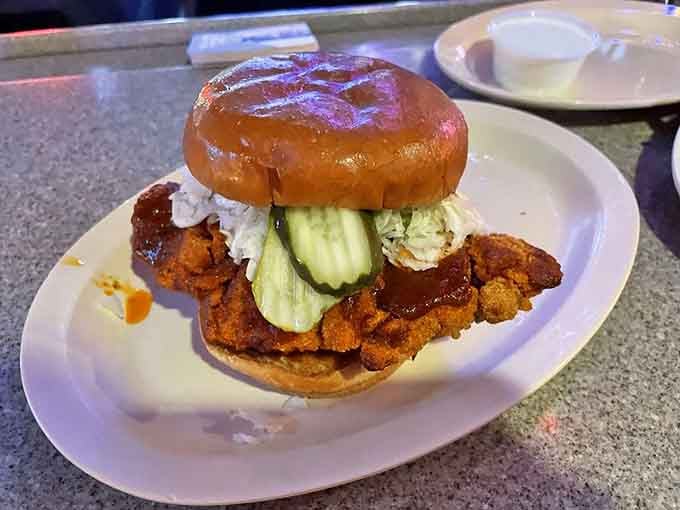 This chicken sandwich on a glazed donut bun is either genius or madness, possibly both simultaneously.