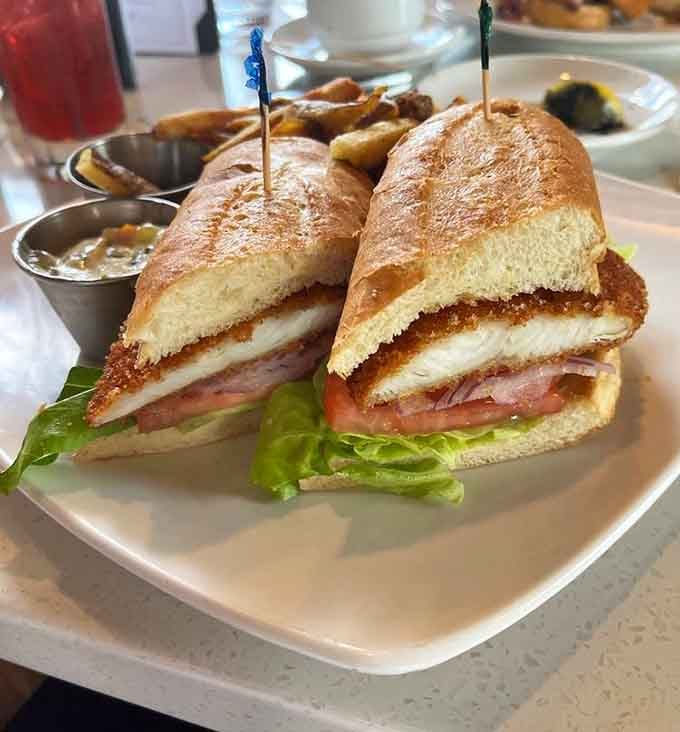 A walleye sandwich that honors Minnesota's favorite fish while making it fancy enough for this retro-glam setting.