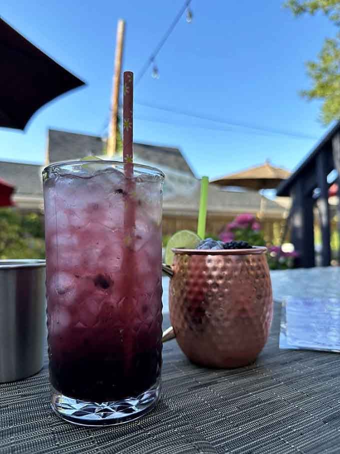 Berry-infused cocktails on the patio because brunch without beverages is just a sad breakfast, honestly.