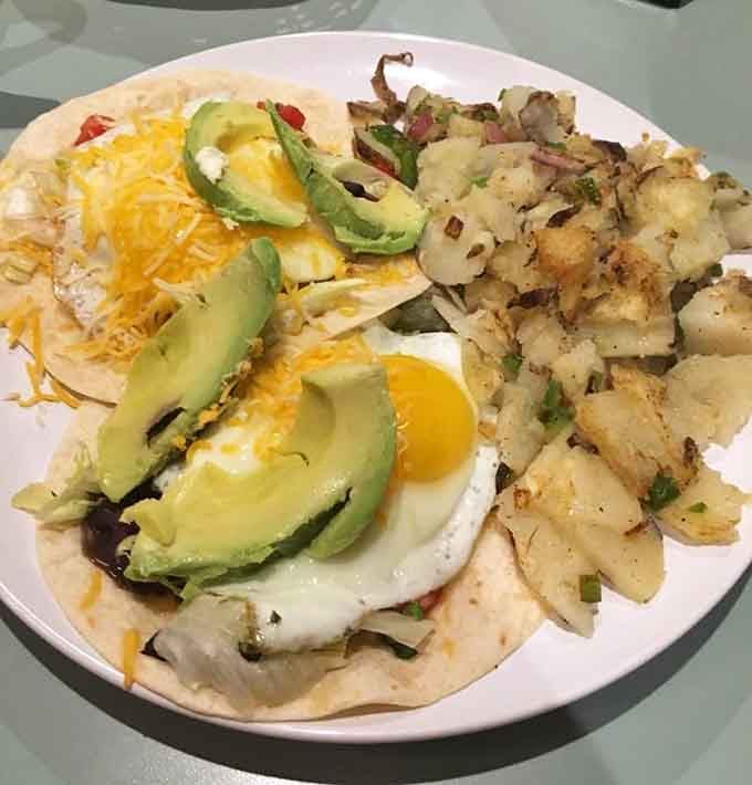 Huevos rancheros done right, where tortillas meet runny eggs and create the kind of morning magic worth waking up for.