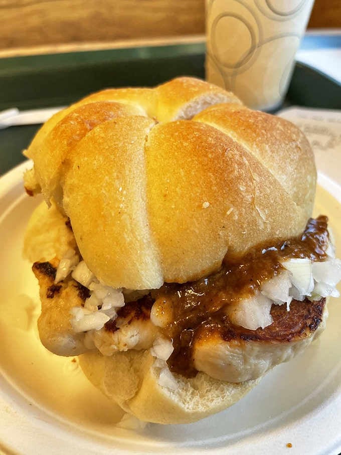 This grilled chicken sandwich sits there looking innocent, but it's secretly converting hot dog purists one bite at a time.