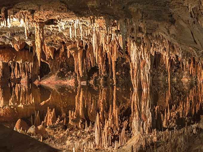 When stalactites and stalagmites create mirror images, you get nature's version of a Rorschach test underground.