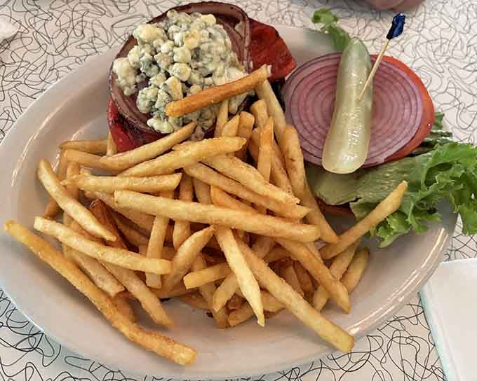 Golden fries piled like edible treasure, because some things don't need to be complicated to be perfect.