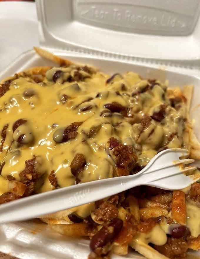 Chili cheese fries that understand their mission is pure indulgence, not winning any health food awards today.