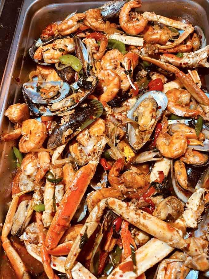 This seafood situation features more shrimp, mussels, and crab than a beach town festival, all gloriously stir-fried together.
