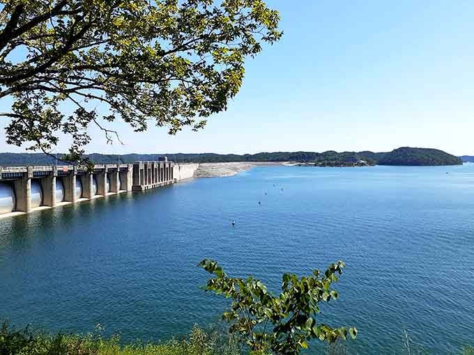 Peaceful waters stretch behind this engineering marvel, creating recreational paradise from Tennessee River's mighty flow.
