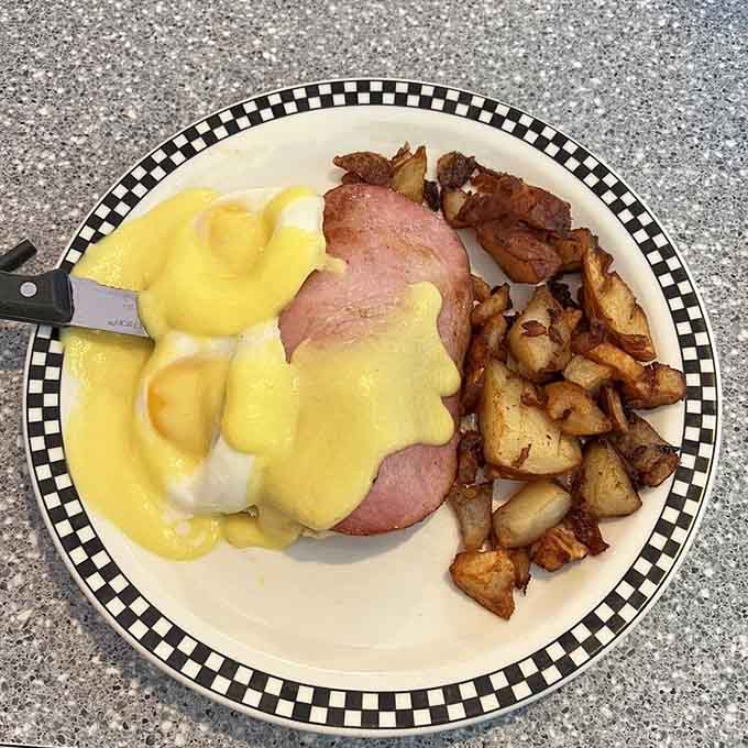 Hollandaise cascading over perfectly poached eggs like liquid gold, because some mornings demand a little extra elegance and indulgence.