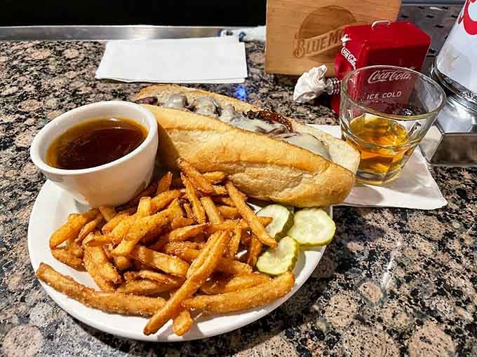French dip with a side of fries and au jus for dunking is the kind of meal that fixes bad days.