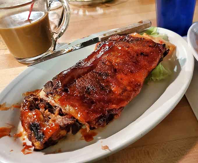 A slab of ribs so tender it's practically falling off the bone before you even pick up your fork.