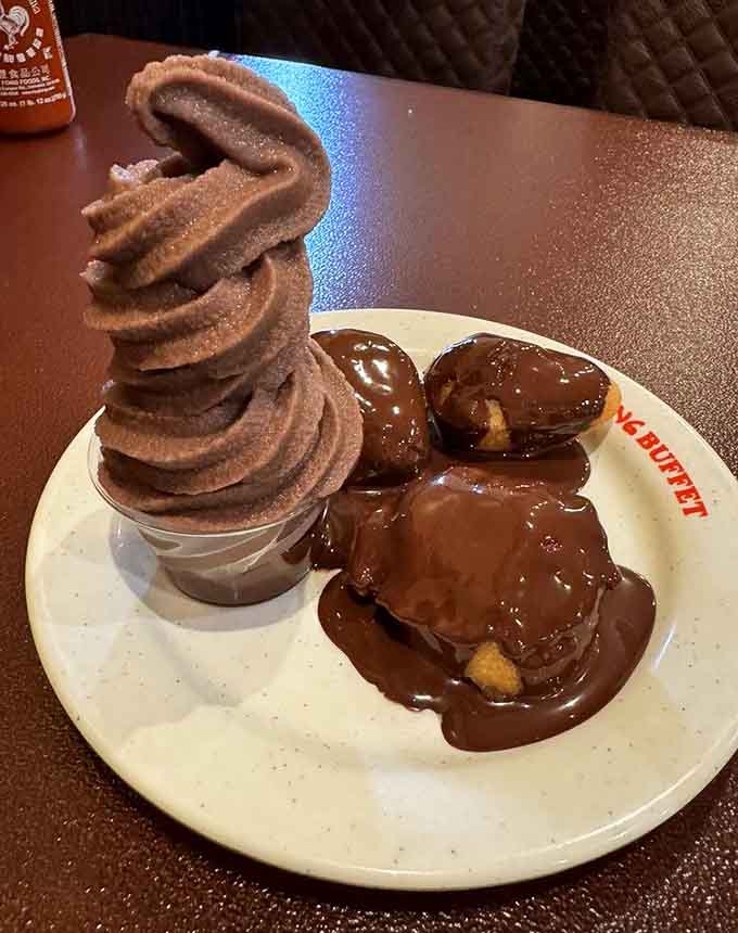 Soft-serve ice cream meets chocolate-dipped profiteroles in what can only be described as a summit of sweetness.