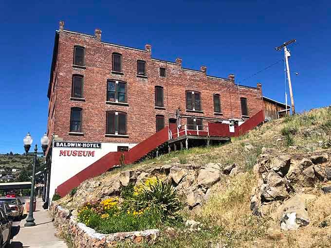 The Baldwin Hotel Museum stands proud on its hillside, preserving history one brick at a time.