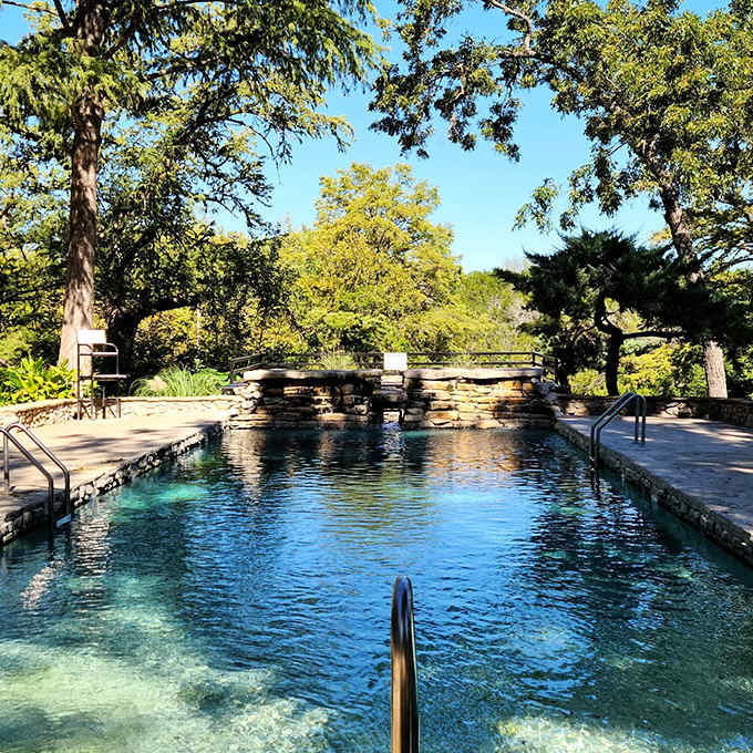 That impossibly blue pool surrounded by limestone and greenery looks like someone's screensaver came to life, only better.