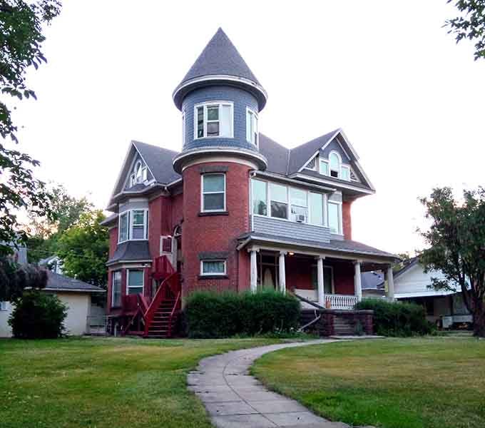 This turret-topped beauty proves that architectural character doesn't have to come with a million-dollar price tag attached.