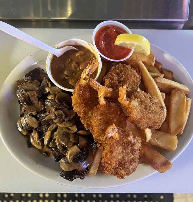 Perfectly breaded shrimp with saut&eacute;ed mushrooms, because sometimes surf needs a little turf for company.