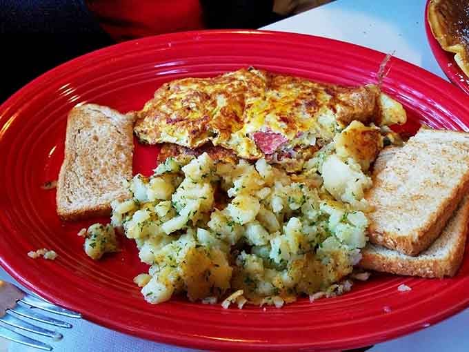 A hearty omelet with home fries and toast proves that sometimes the classics are classic for a very good reason.