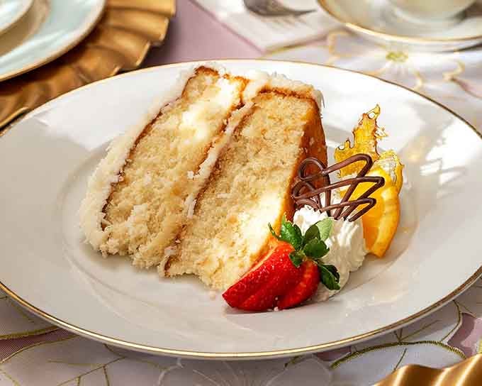 This towering slice of cake with fresh strawberries makes every day feel like someone's special birthday celebration.