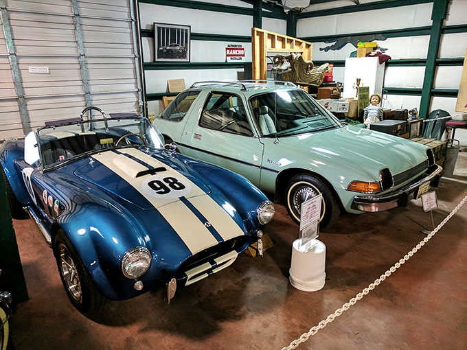 That blue beauty with racing stripes isn't just sitting there, it's practically begging for a joyride.