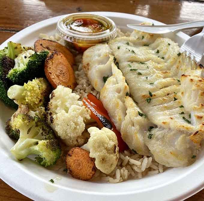 Broiled cod with colorful vegetables proves healthy choices don't have to sacrifice flavor or satisfaction at the table.