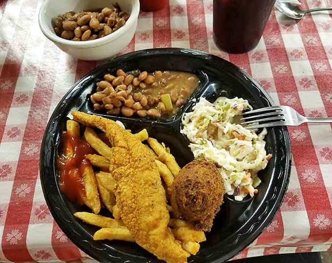 All-you-can-eat catfish with jalape&ntilde;o hushpuppies, fries, coleslaw, and pinto beans&mdash;stretchy pants are absolutely mandatory for this feast.