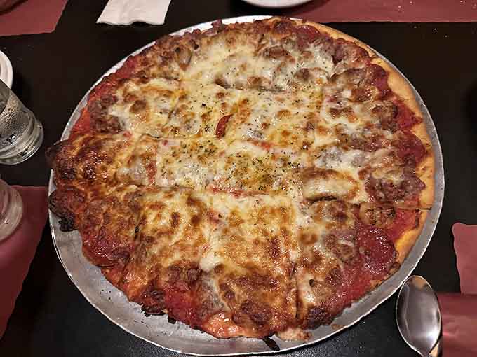 Thin crust pizza with cheese coverage that would make any pizza purist weep tears of pure joy.