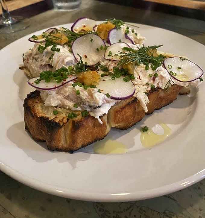 Radish slices and fresh herbs crown this trout dip on toast, turning simple ingredients into something your friends will photograph endlessly.