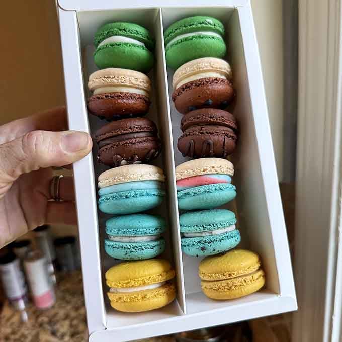 This box of macarons is basically edible joy, perfectly packaged for maximum happiness delivery.