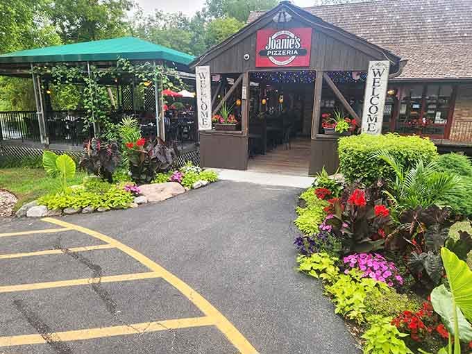 Flowers burst from every corner like someone told the gardener more is definitely more, and they listened.