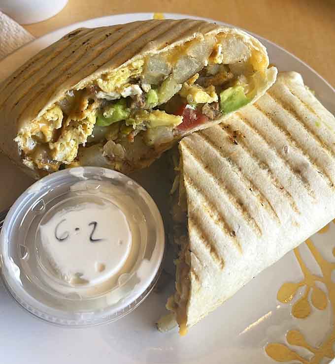 The breakfast burrito comes grilled with those perfect char marks that signal someone knows exactly what they're doing.