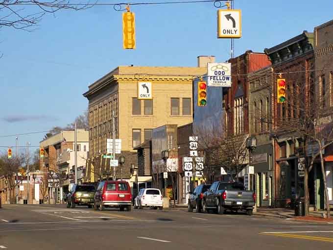 The Odd Fellow sign reminds you that small-town quirks beat big-city conformity every single time, no contest.