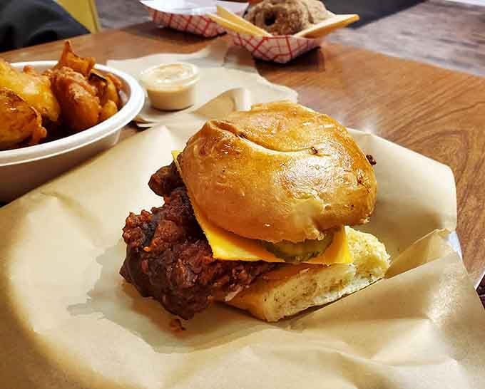 That chicken sandwich on a pretzel bun is the kind of creation that makes you question every sandwich choice you've ever made.