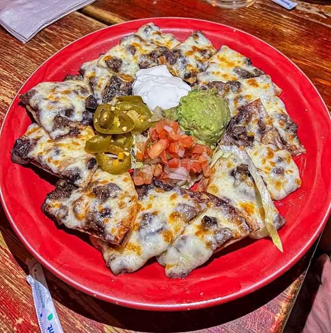 These nachos prove that cheese distribution is both a science and an art form worth mastering.
